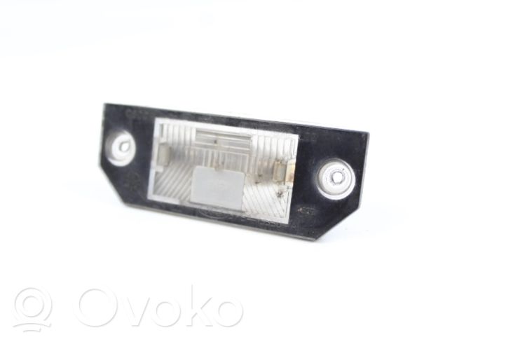 3M5A13550A Ford Focus Number plate light, 8.00 € | RRR